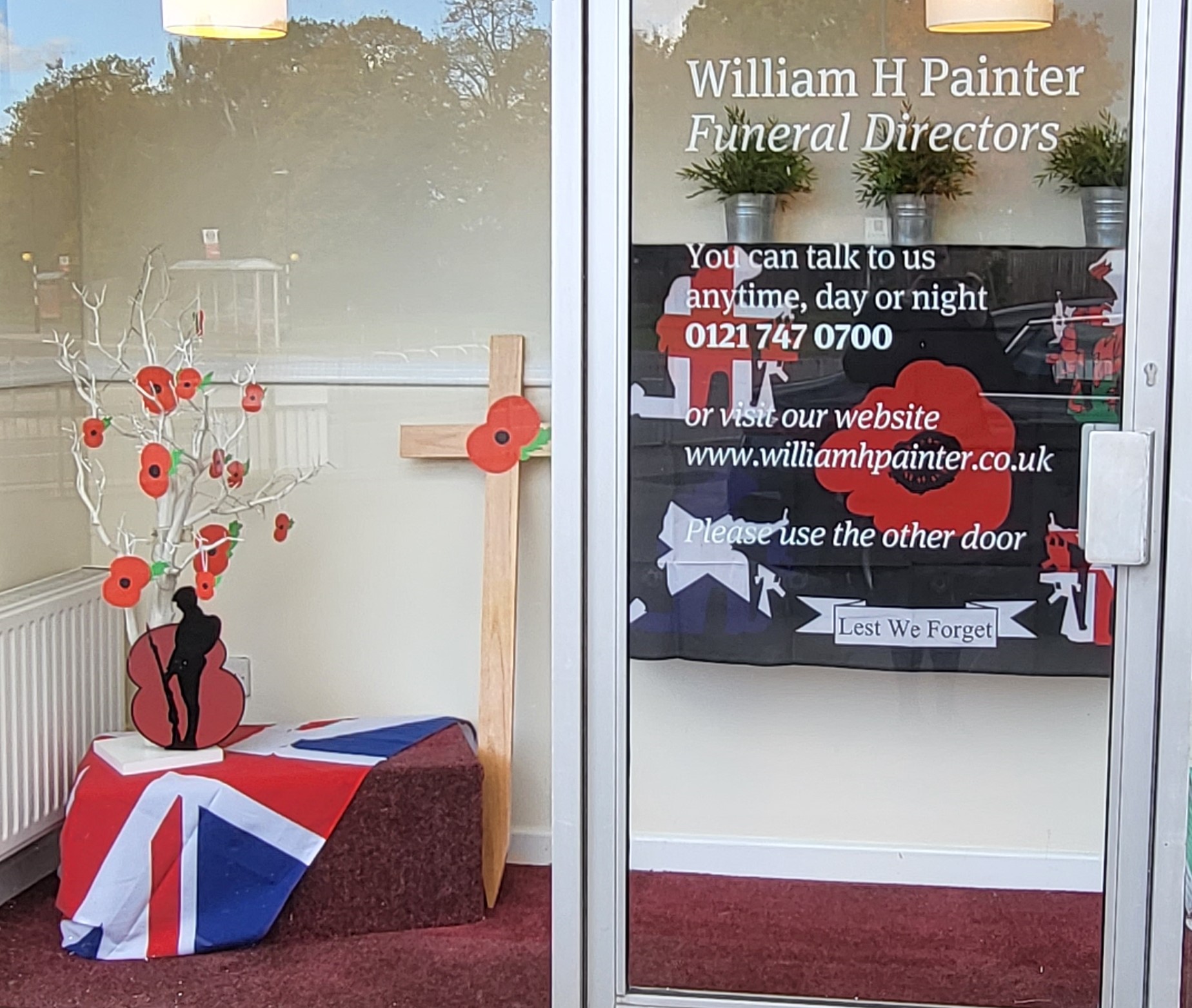 Remembrance Day window display - William H Painter Funeral Directors